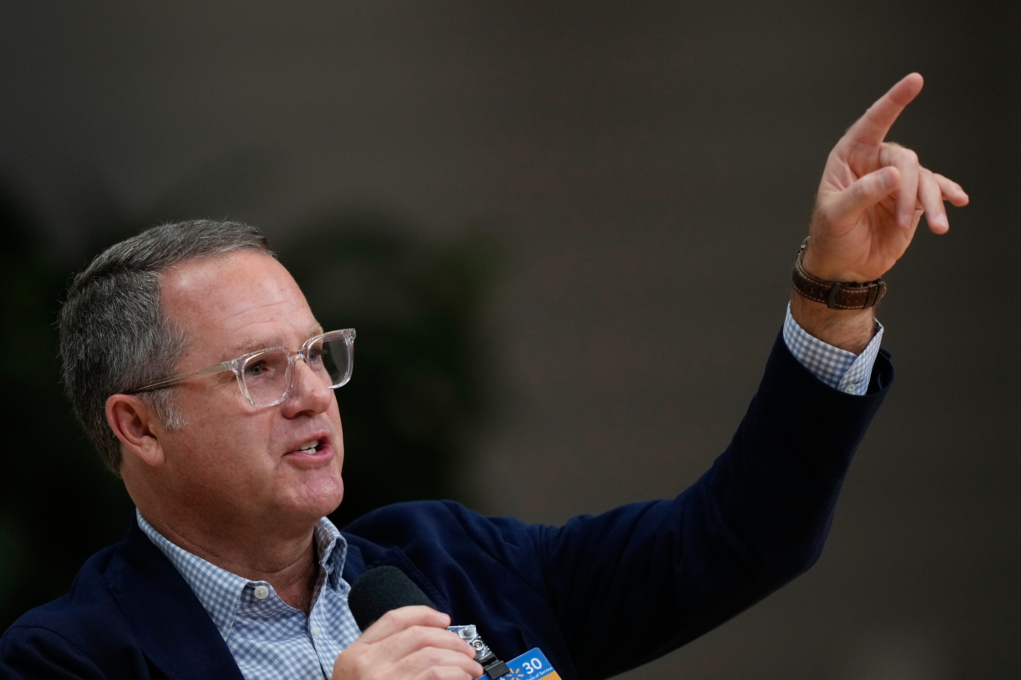 Doug McMillon, the CEO of Walmart, will retire in January 2026, being ...