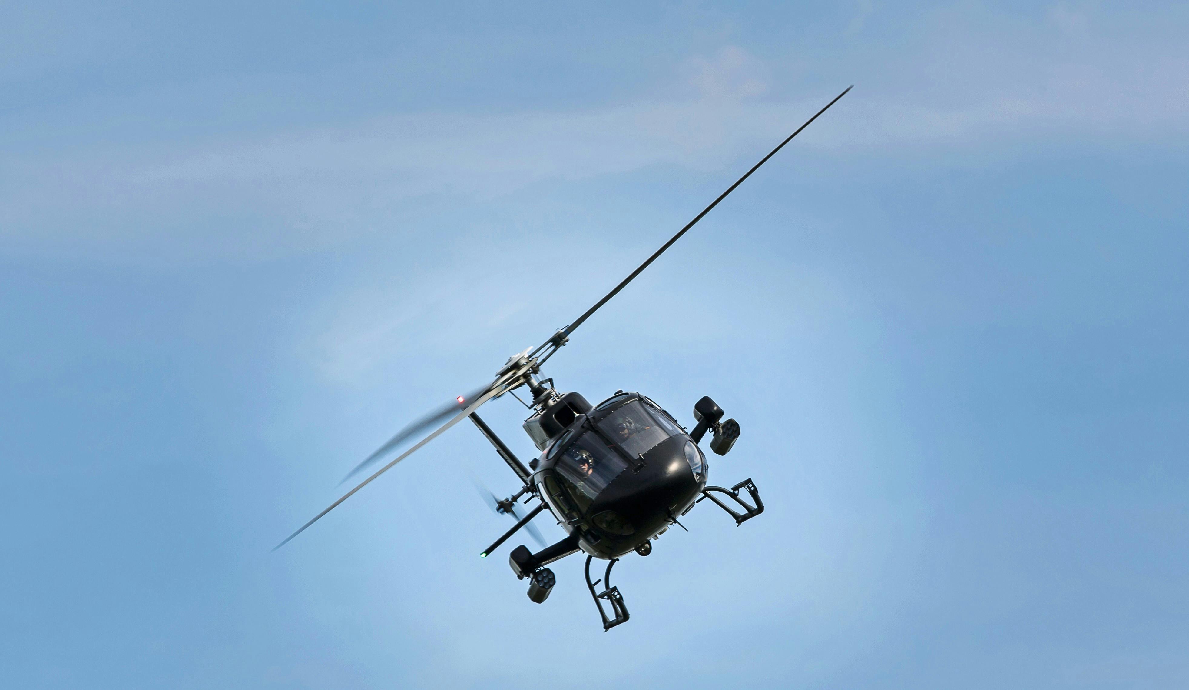 Two helicopters, an Enstrom F-28A and an Enstrom 280C, collided in the ...